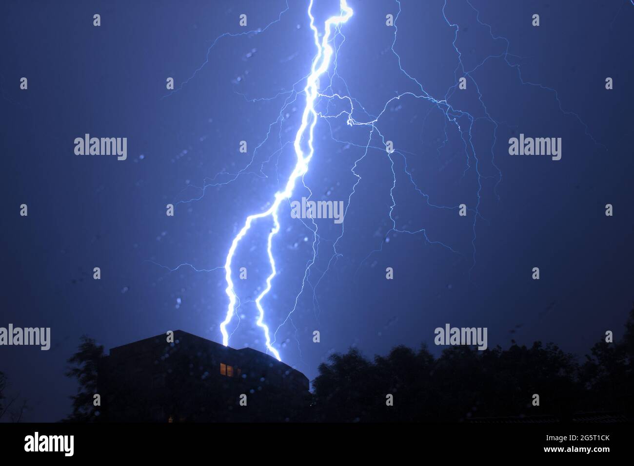 Lightning in the night Stock Photo - Alamy