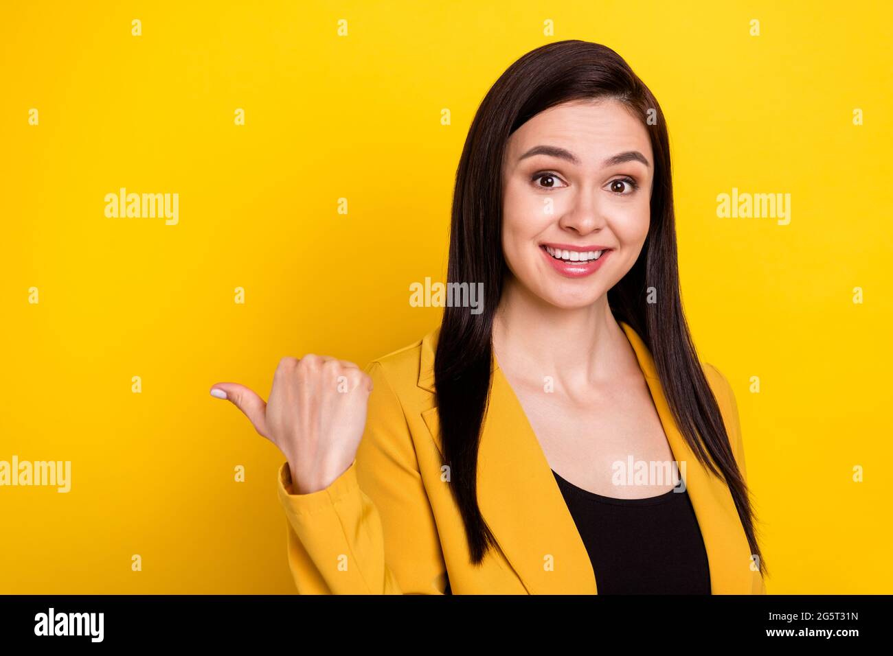 Photo of hooray young brunet lady point empty space wear yellow blazer ...