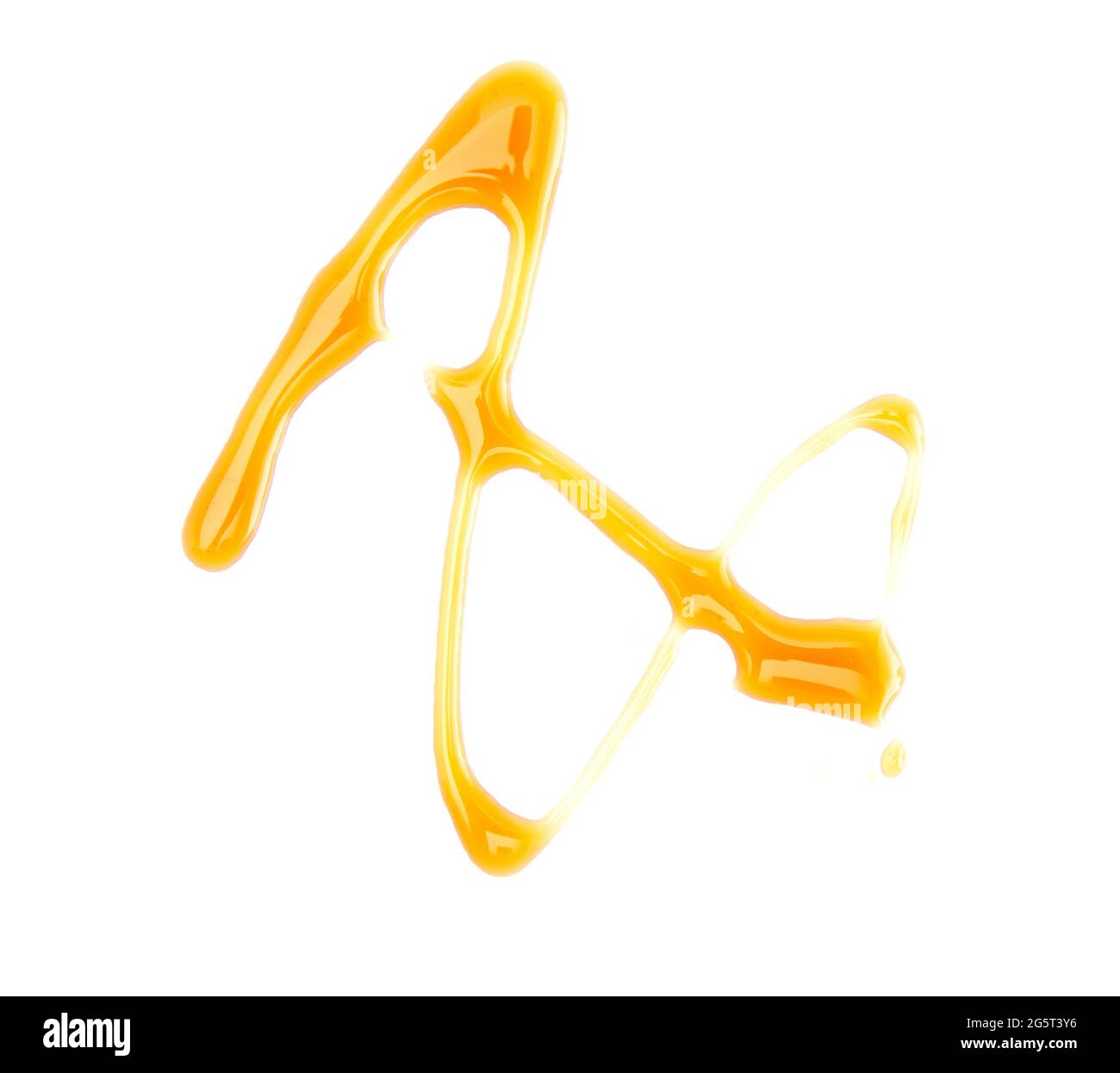 A Twirl of Maple Syrup Spilled on a White Background Stock Photo - Alamy