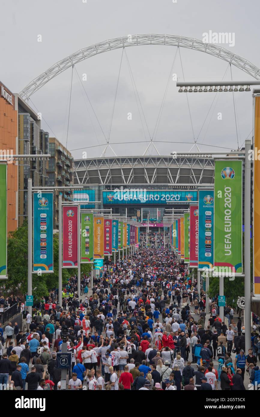 England football fans and supporters arriving at Wembley stadium to ...