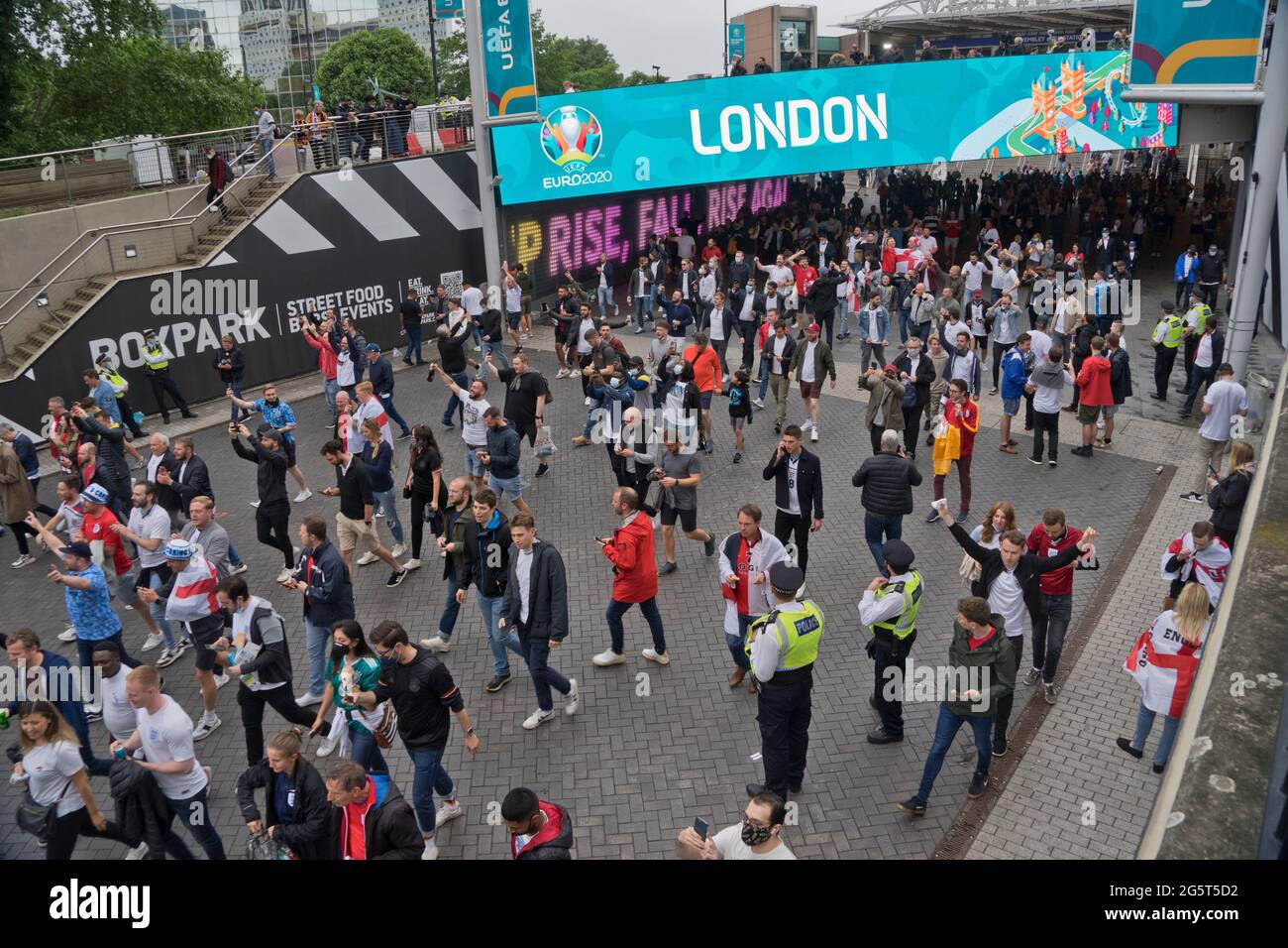 England football fans and supporters arriving at Wembley stadium to ...