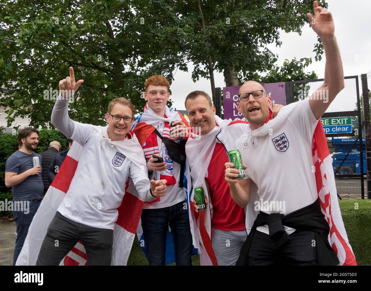 England football fans and supporters arriving at Wembley stadium to ...