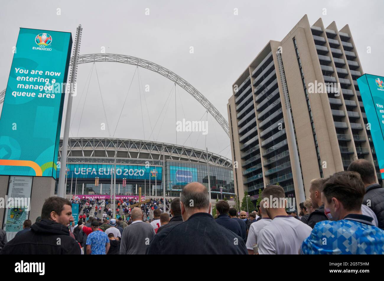 England football fans and supporters arriving at Wembley stadium to ...