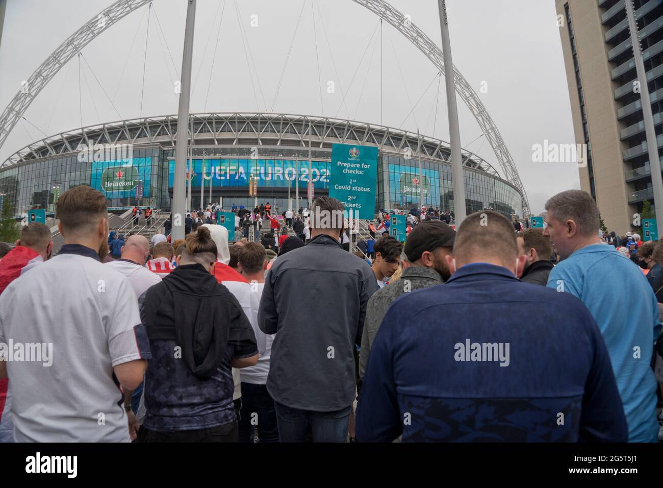 England football fans and supporters arriving at Wembley stadium to ...