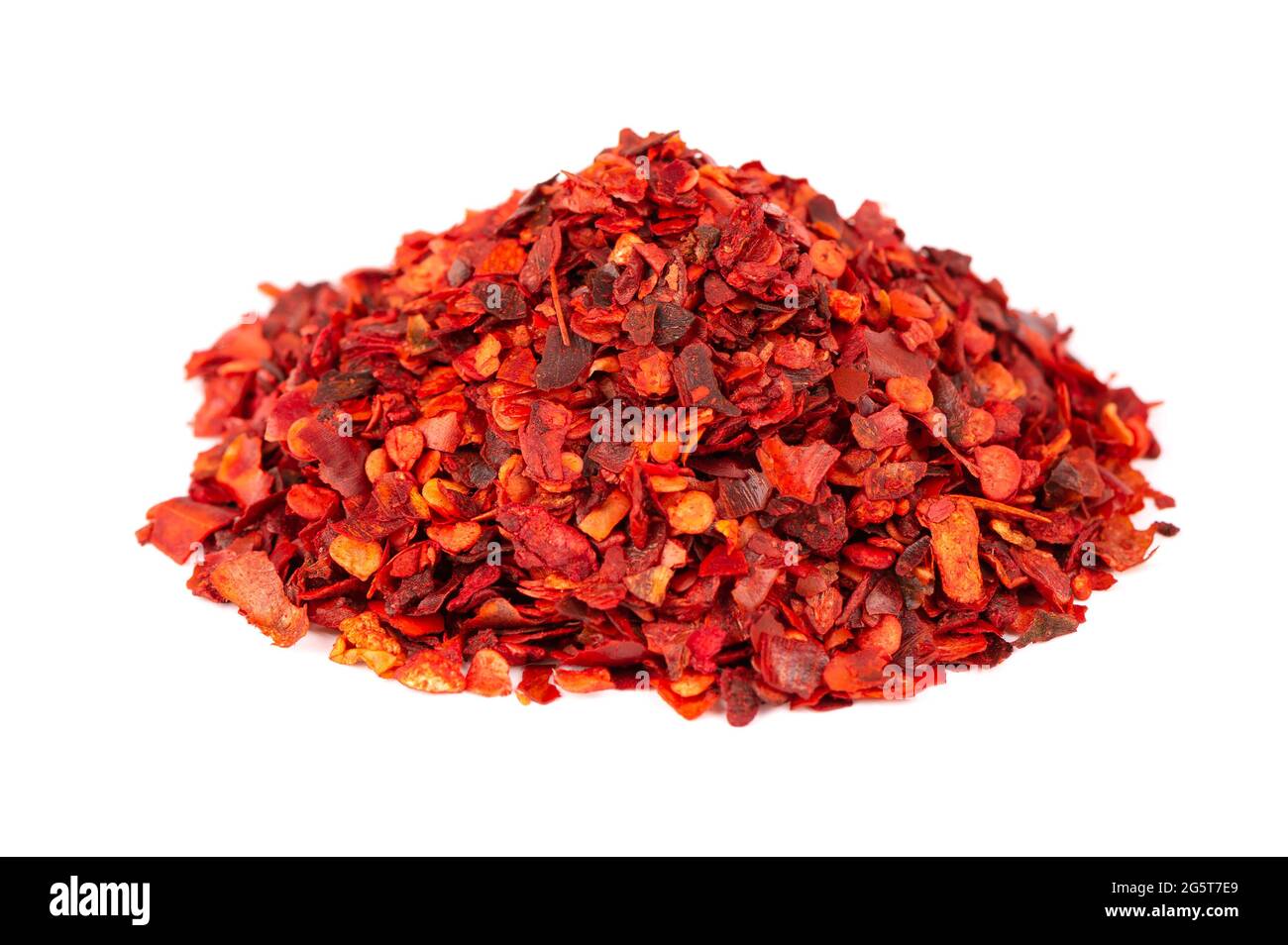 Dried red chili flakes with seeds, isolated on white background ...