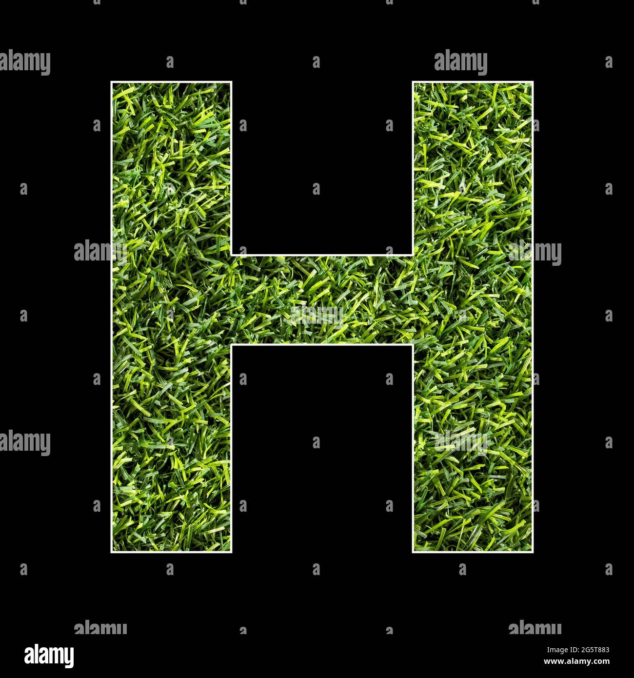 Letter H - Artificial grass background texture Stock Photo - Alamy