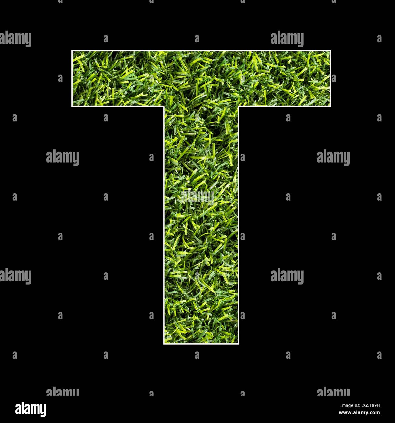 Letter T - Artificial grass background texture Stock Photo - Alamy