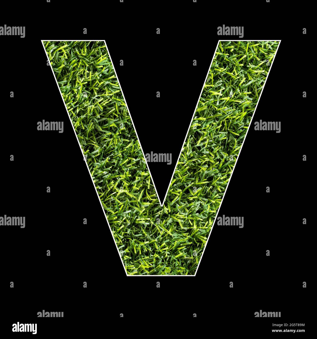 Letter V - Artificial grass background texture Stock Photo - Alamy