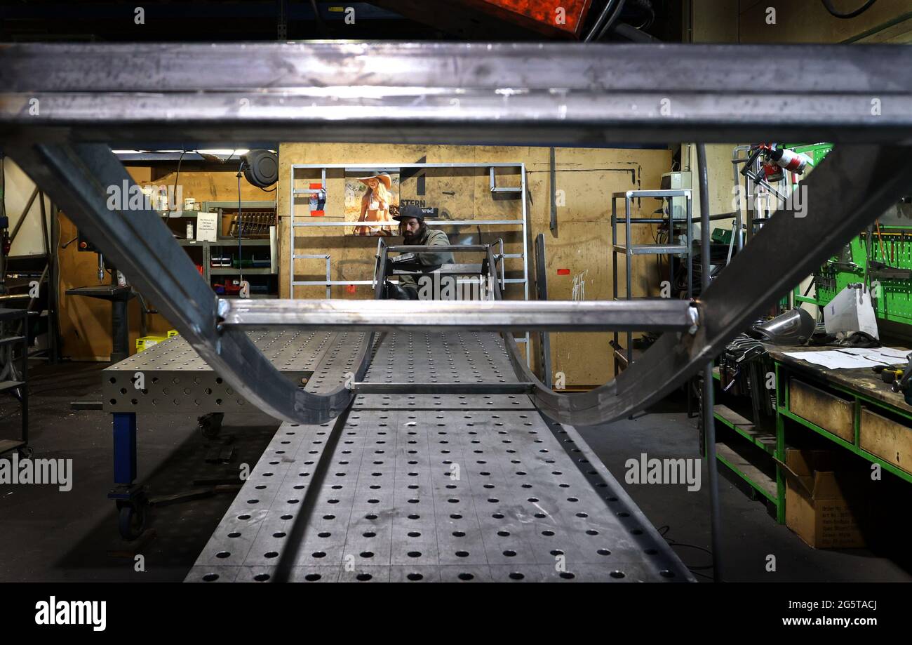 Durach, Germany. 06th May, 2021. An employee of the pumptrack ...