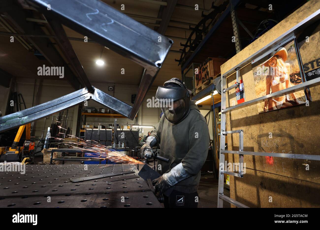 Durach, Germany. 06th May, 2021. An employee of the pumptrack ...