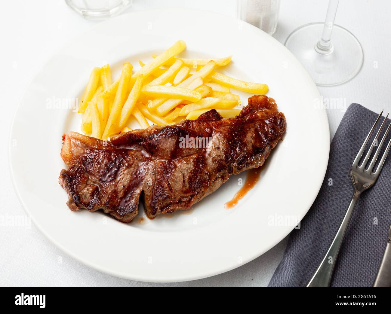 Grilled lamb with french fries, homemade dinner Stock Photo - Alamy