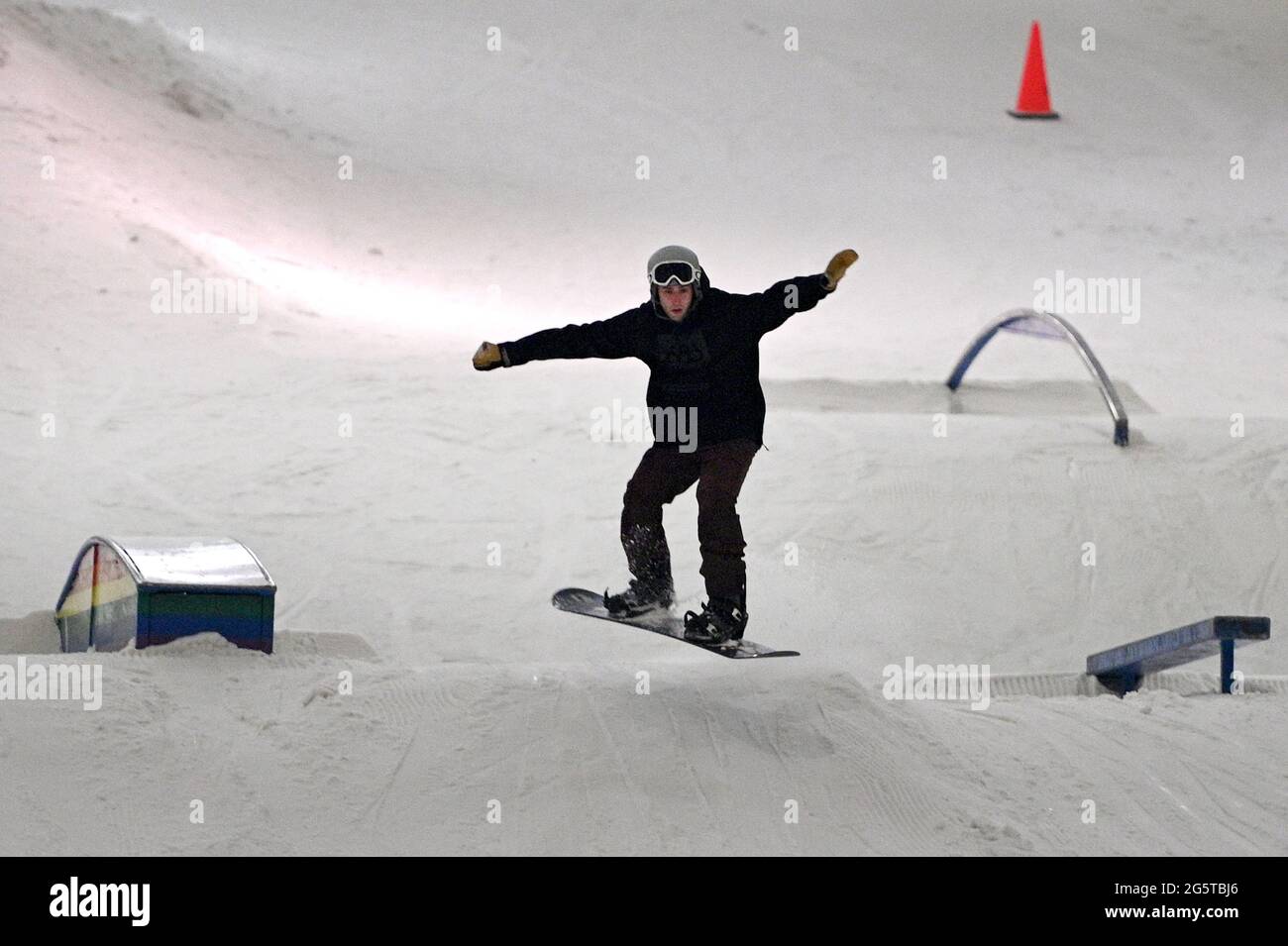 A skier takes a jump at “Big Snow” indoor ski park, at the American ...
