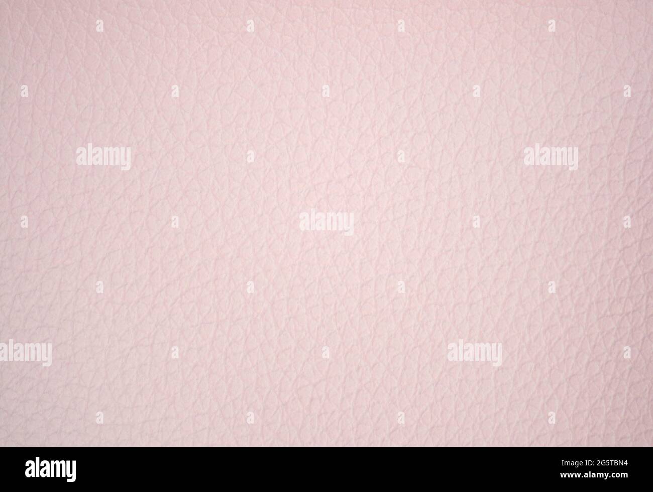 A fragment of a pale pink colored animal skin. Background, pattern ...