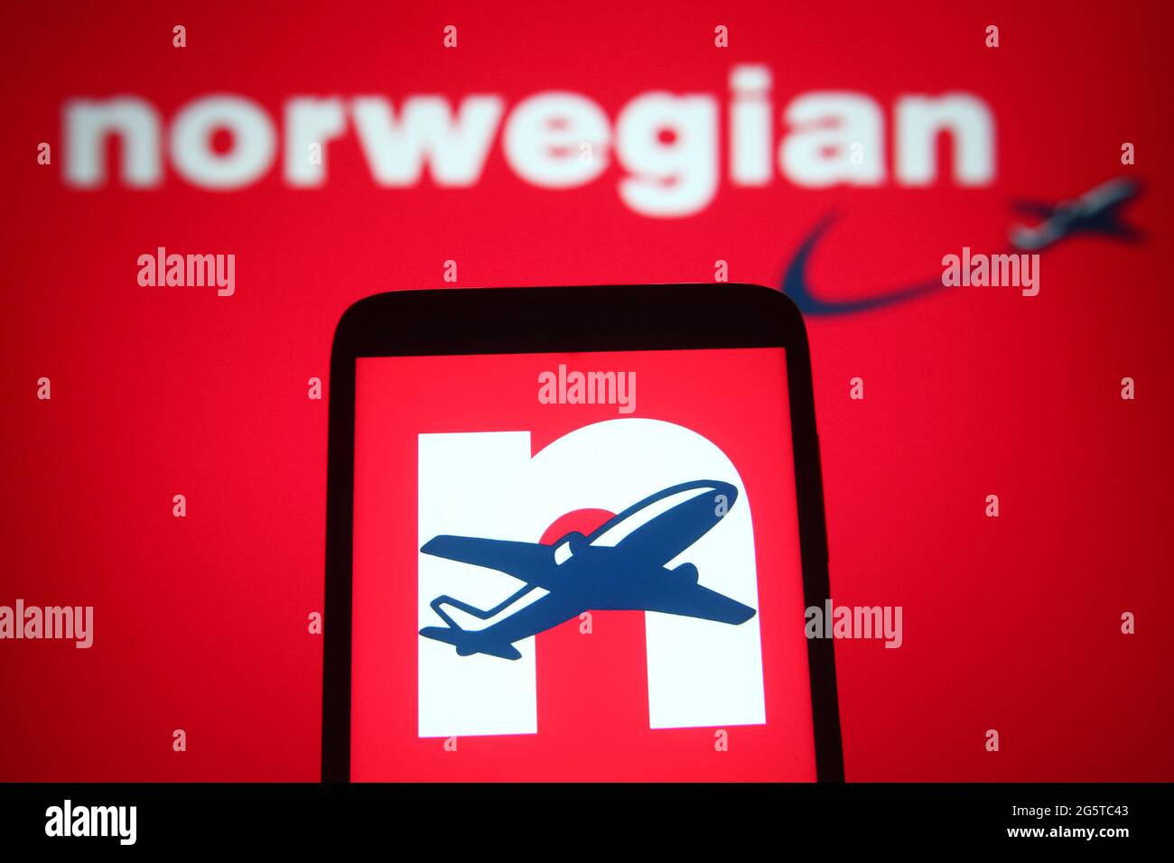 In this photo illustration, Norwegian Air Shuttle logo of a Norwegian ...