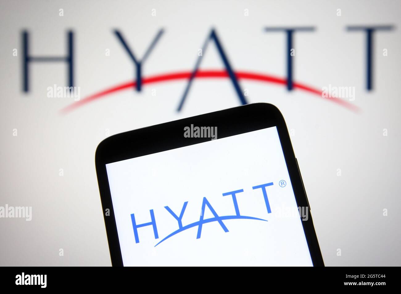 In this photo illustration, Hyatt Hotels Corporation logo is seen on a ...