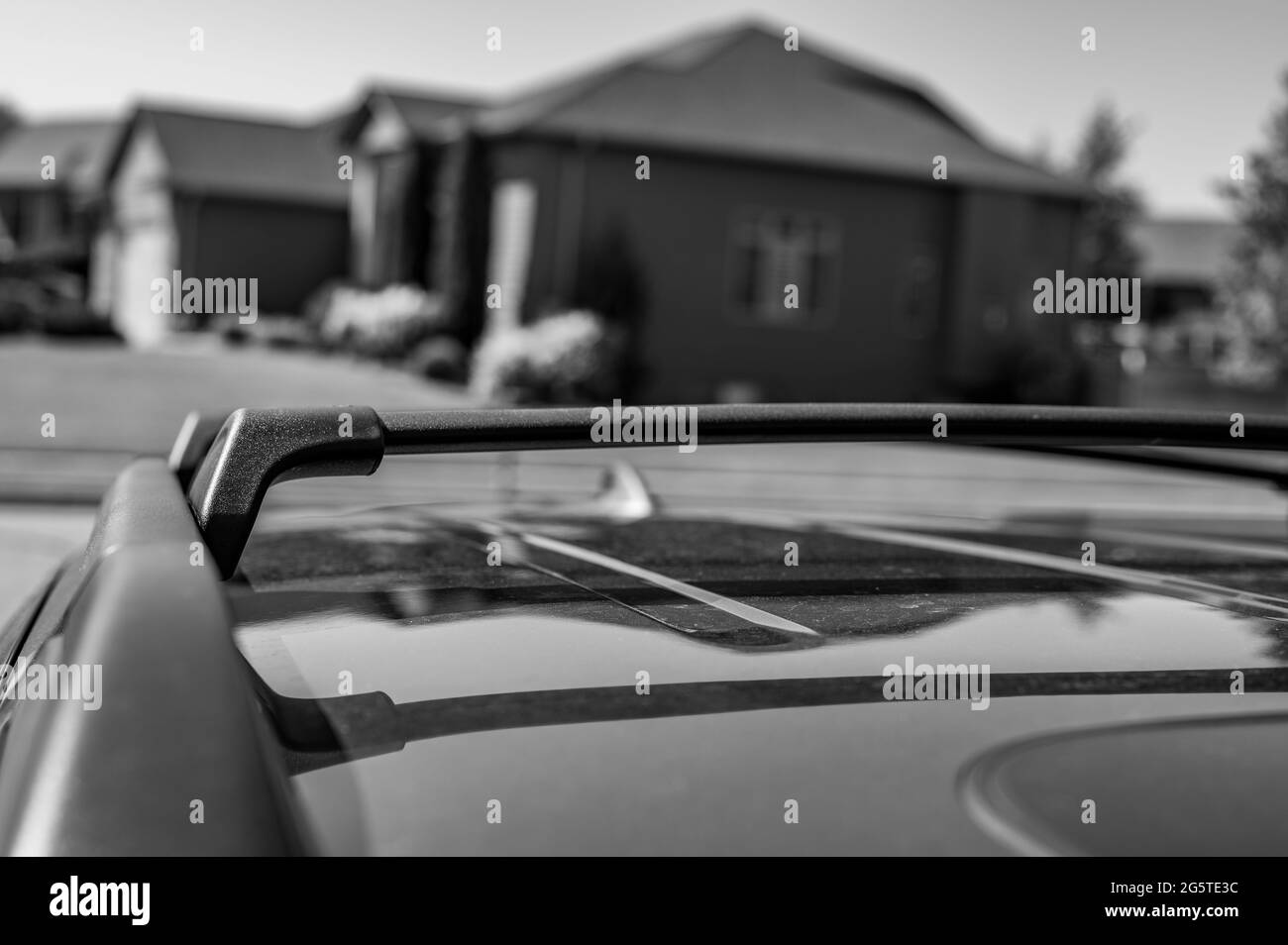 Narrow selective focus on the roof rack with cross bars installed on ...