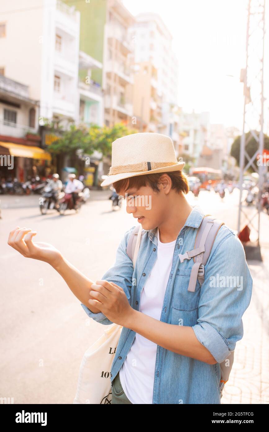 man scratching his itchy skin Stock Photo - Alamy