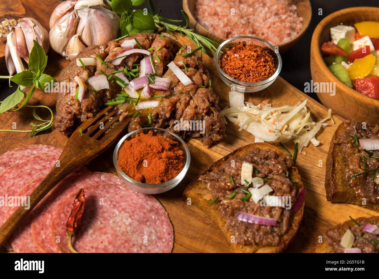 Traditional homemade French steak tartare of raw beef. Steak tartar ...
