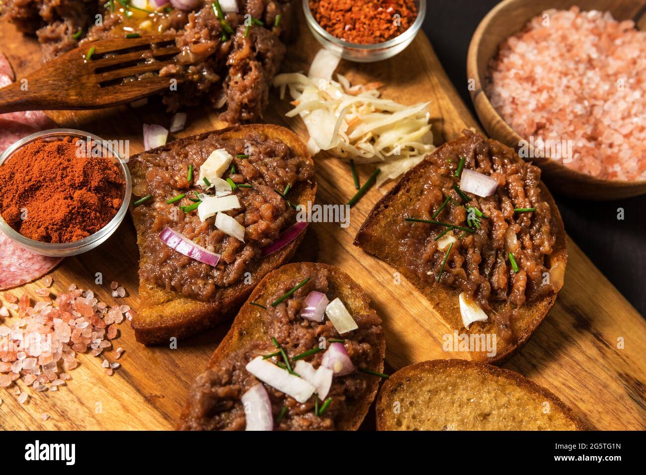 Traditional homemade French steak tartare of raw beef. Steak tartar ...