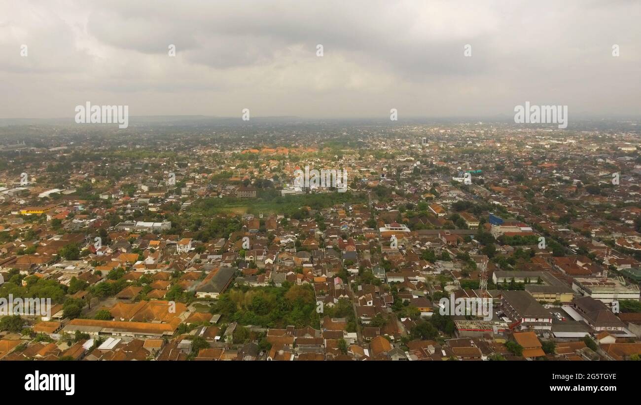 cityscape Yogyakarta with buildings, highway at sunset time. aerial ...