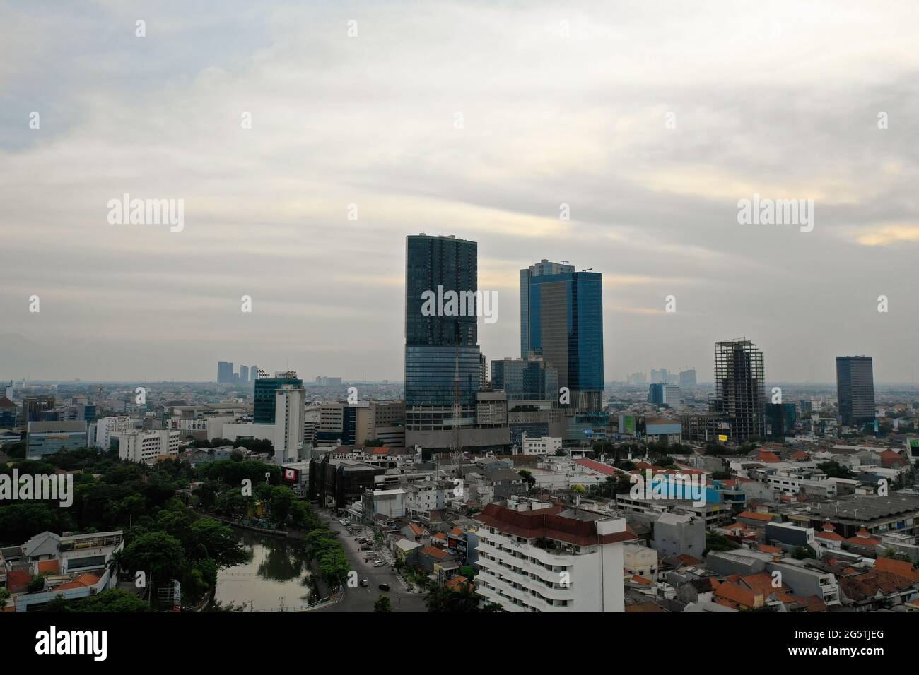 Aerial cityscape modern city Surabaya with skyscrapers, buildings and ...