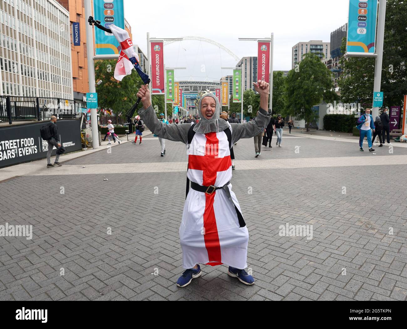 London, UK. 29th June, 2021. An England fan dressed up in the flag of ...