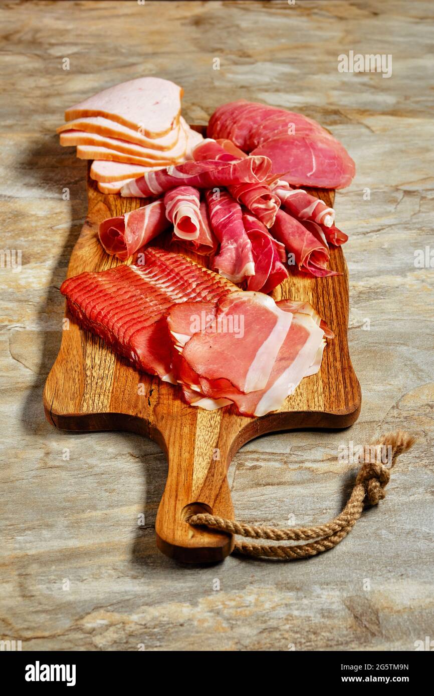 Meat plate snack for wine Stock Photo - Alamy