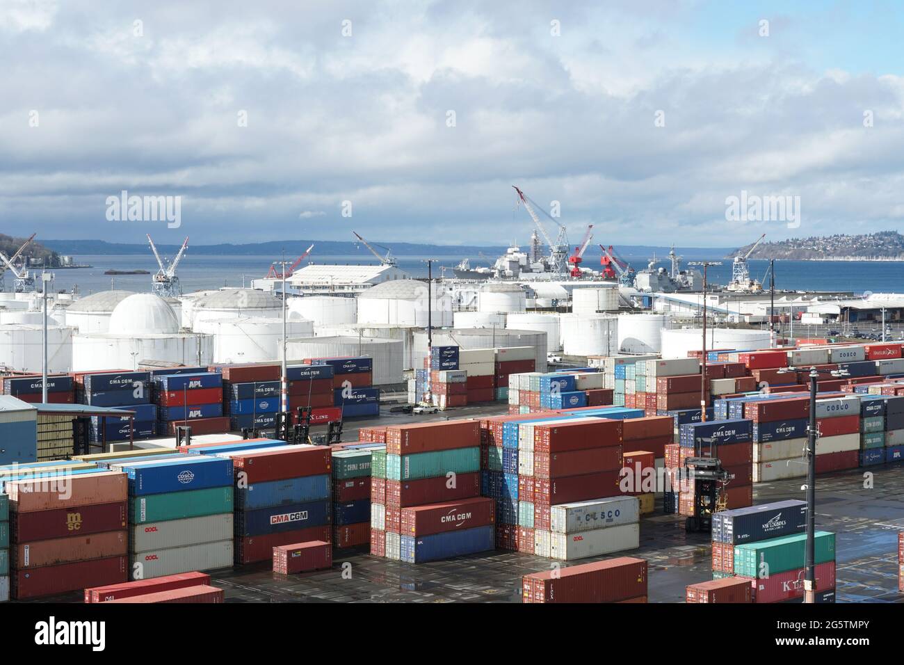 Container terminal in port of Seattle, Washington, USA with white round ...