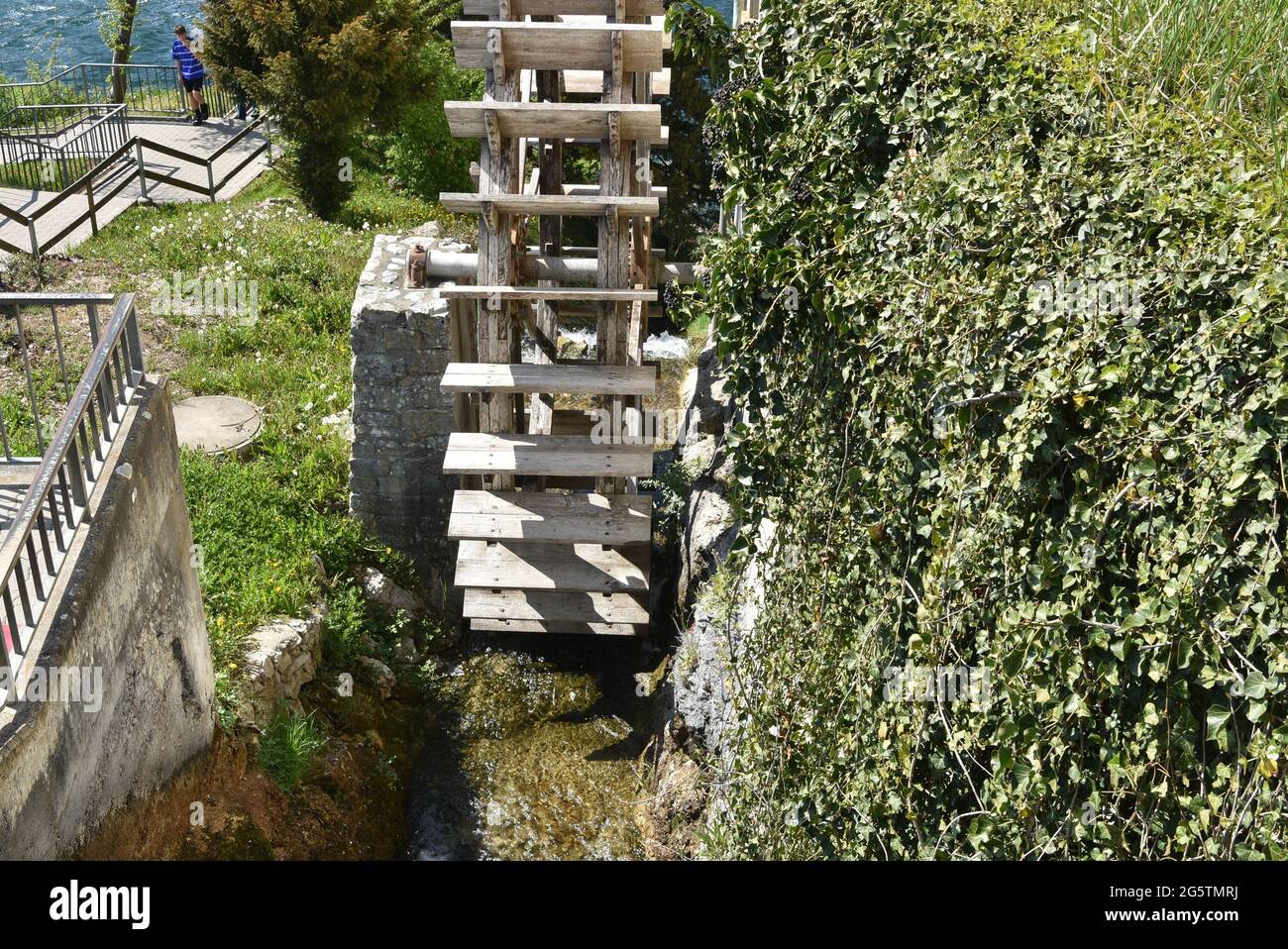 Front view on old wooden water-wheel mill beside house at the Rhine ...