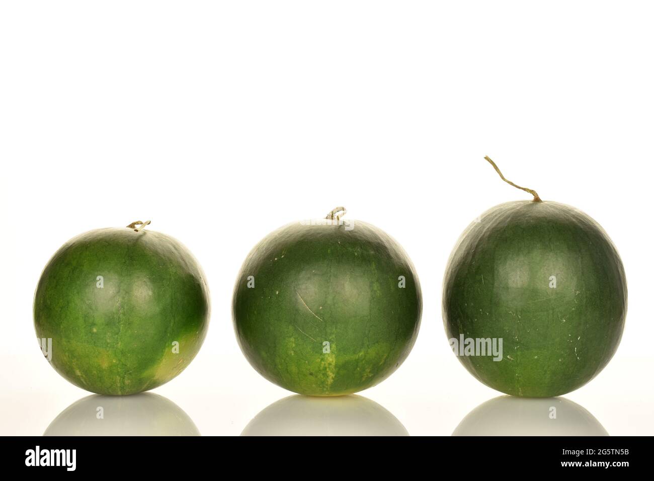 Three ripe organic watermelons, close-up, on a white background Stock ...