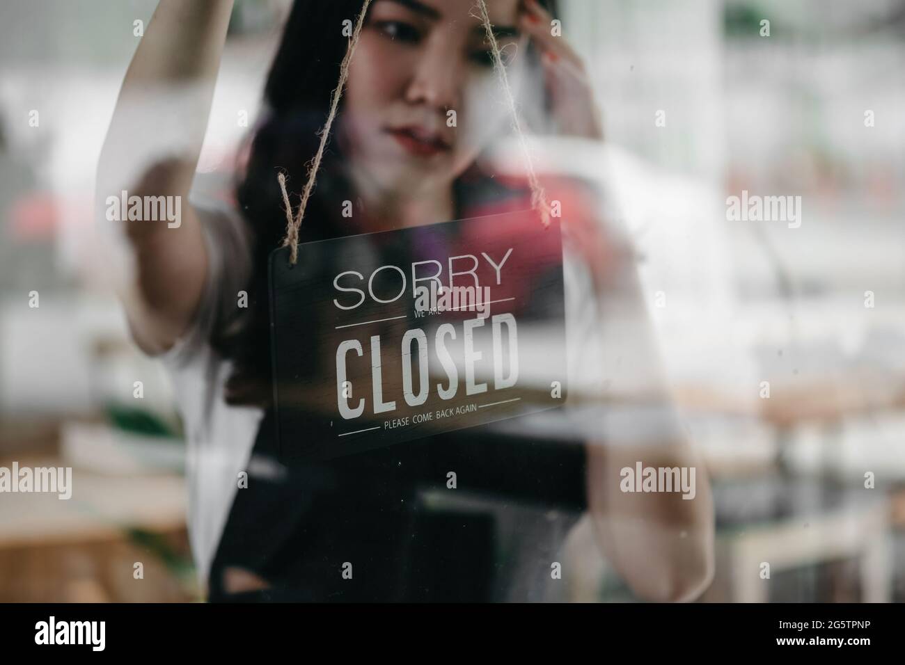 Hanging shop signs hi-res stock photography and images - Alamy