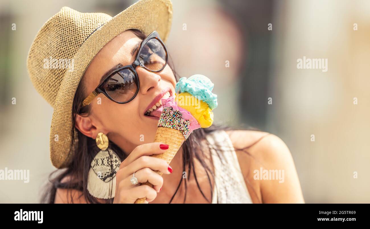 Woman licks ice cream hi-res stock photography and images - Alamy