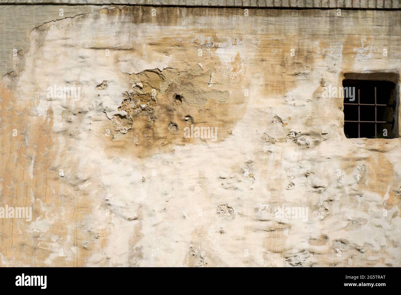 Moldy stone wall through damp walls structure photographed in daylight ...