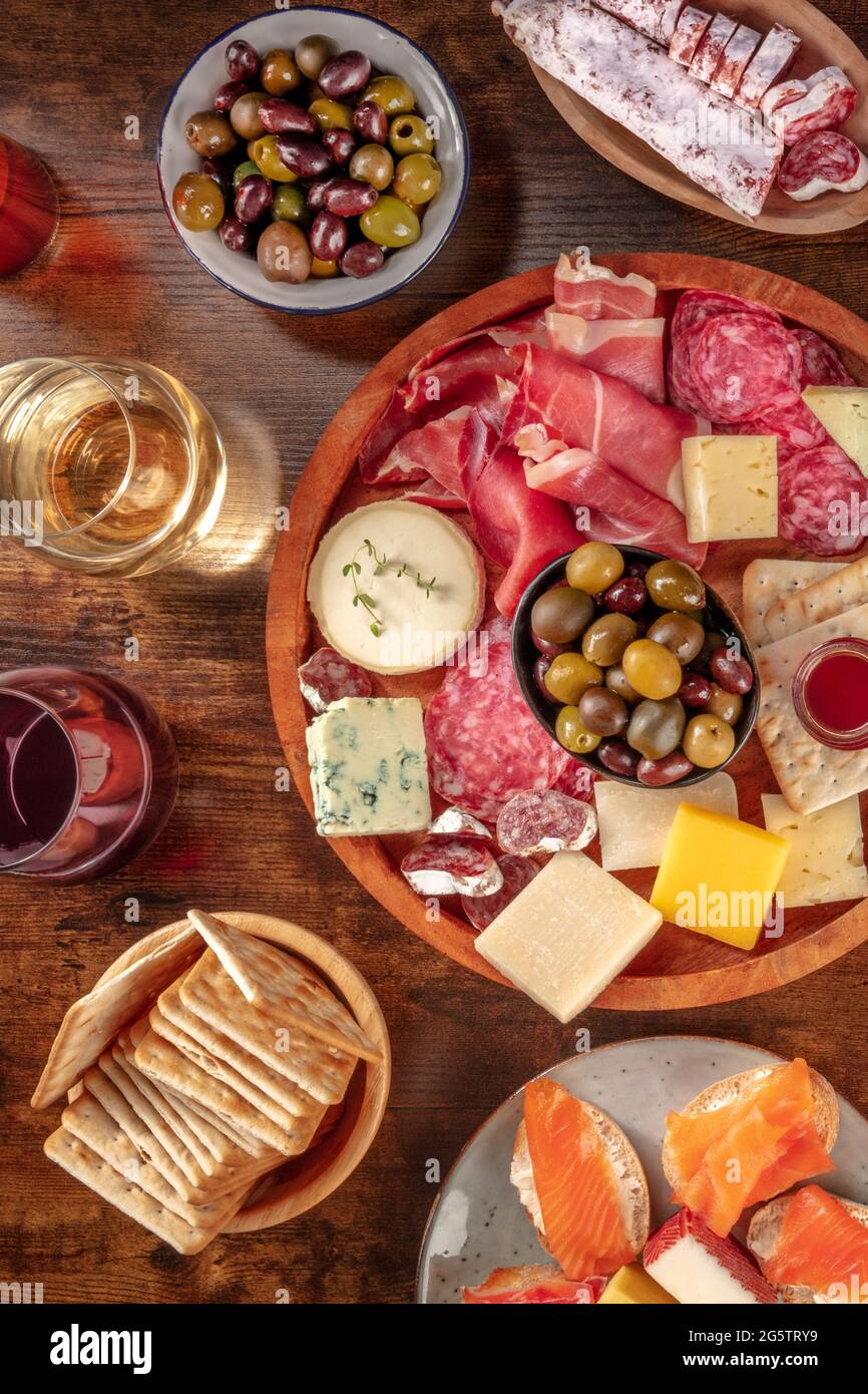 Italian antipasti or Spanish tapas with wine. Gourmet charcuterie and ...