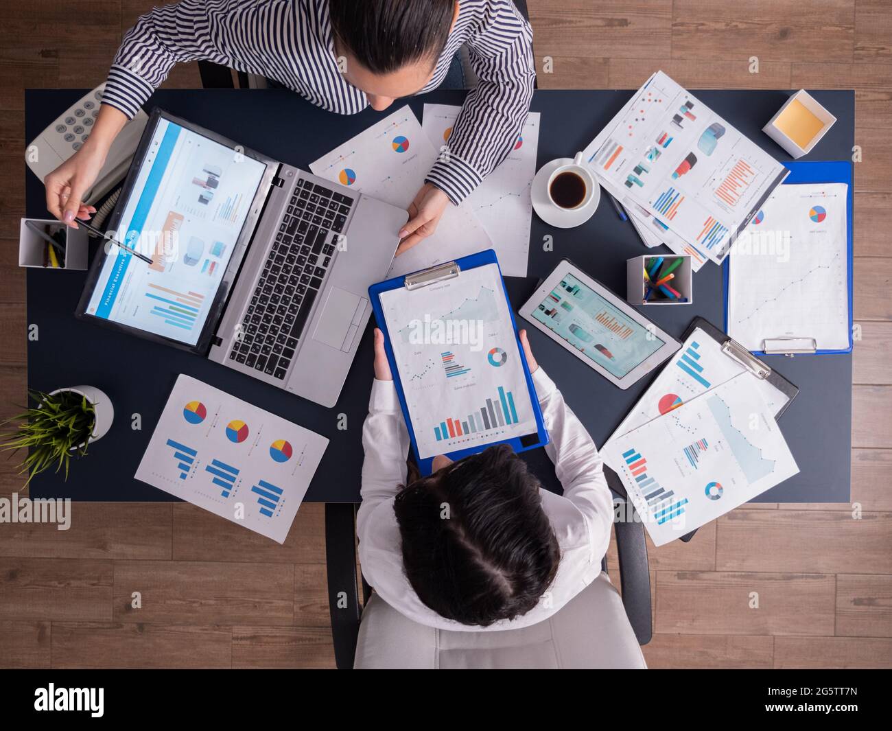 Top viewTop view of manager and employee doing teamwork in business ...