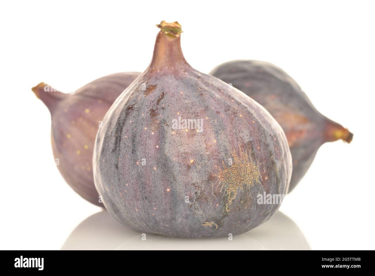 Three ripe organic figs, close-up, isolated on white Stock Photo - Alamy