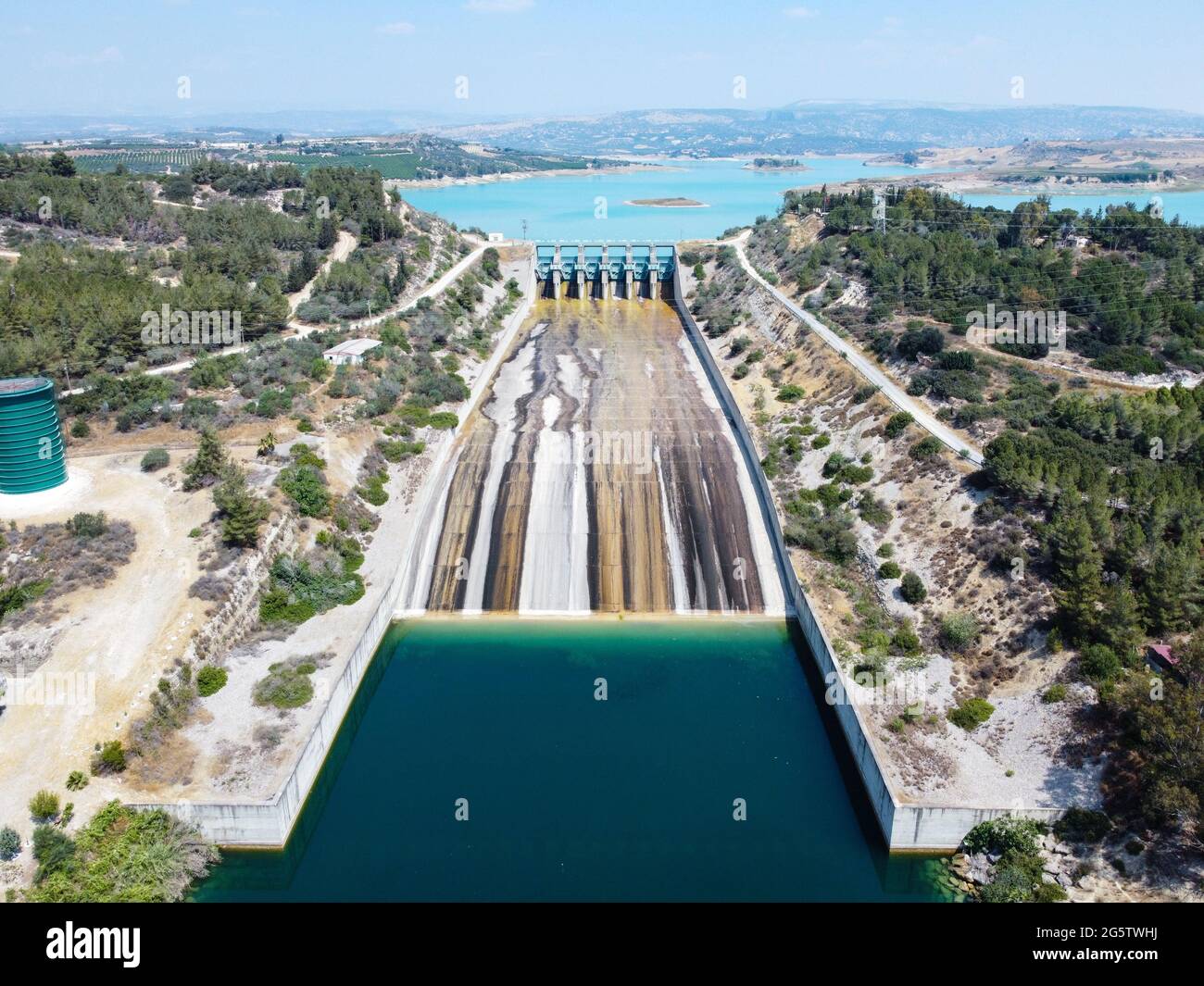 Aerial view of water reservoir, concrete rapid and closed reservoir ...