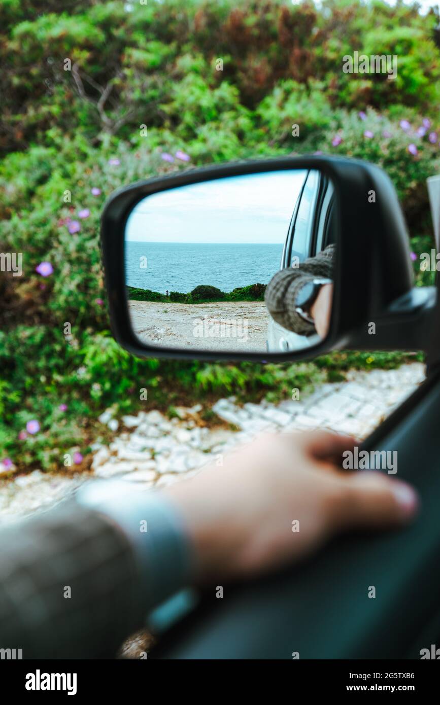 sea reflection in car rear mirror. road trip. summer vacation Stock ...