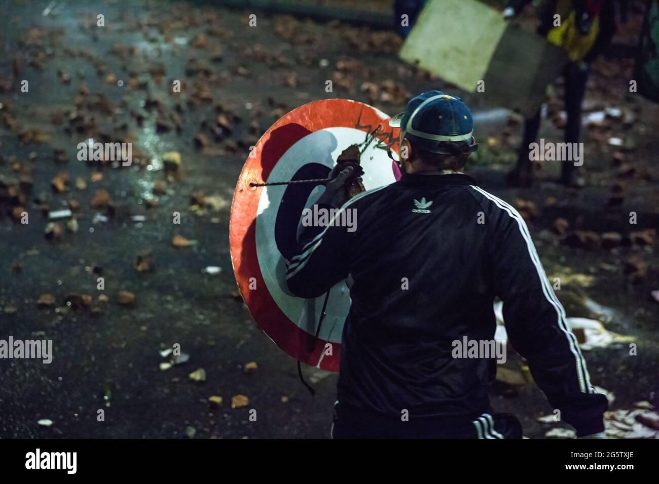 June 27, 2021, Bogota, Colombia: A member of the front line holding a ...