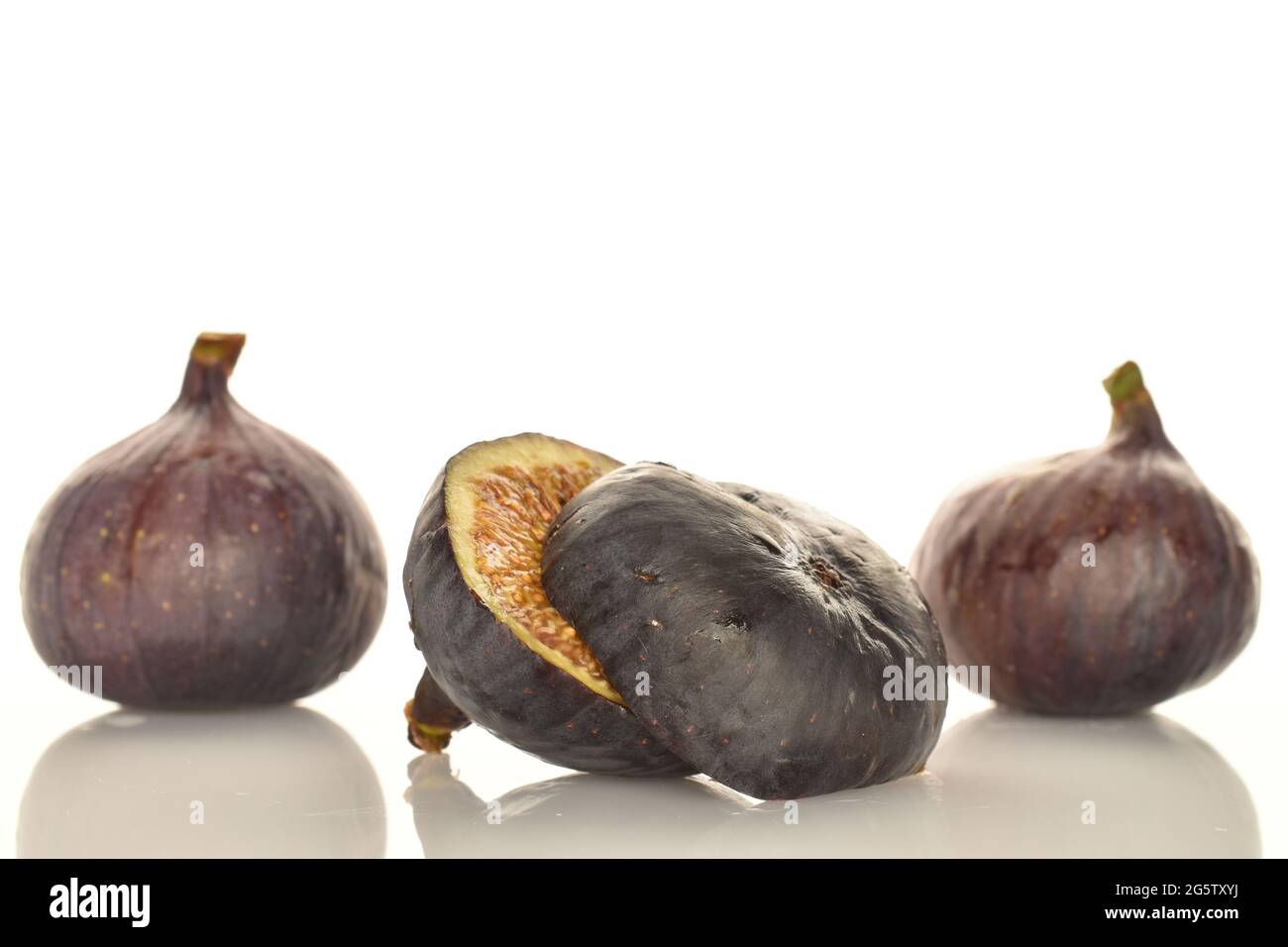 Ripe organic figs, close-up, isolated on a white background Stock Photo ...