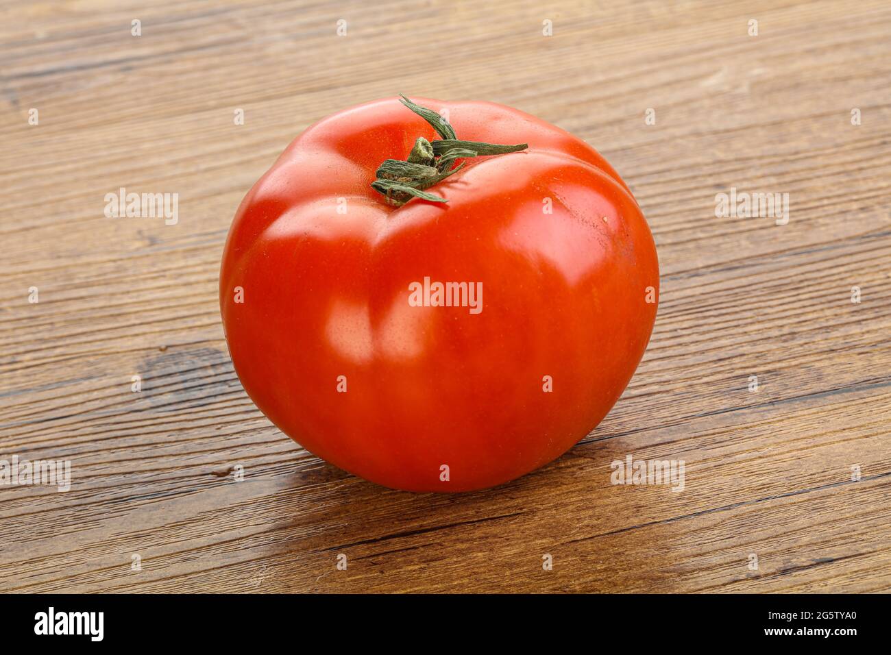 Red ripe big juicy tomato isolated Stock Photo - Alamy