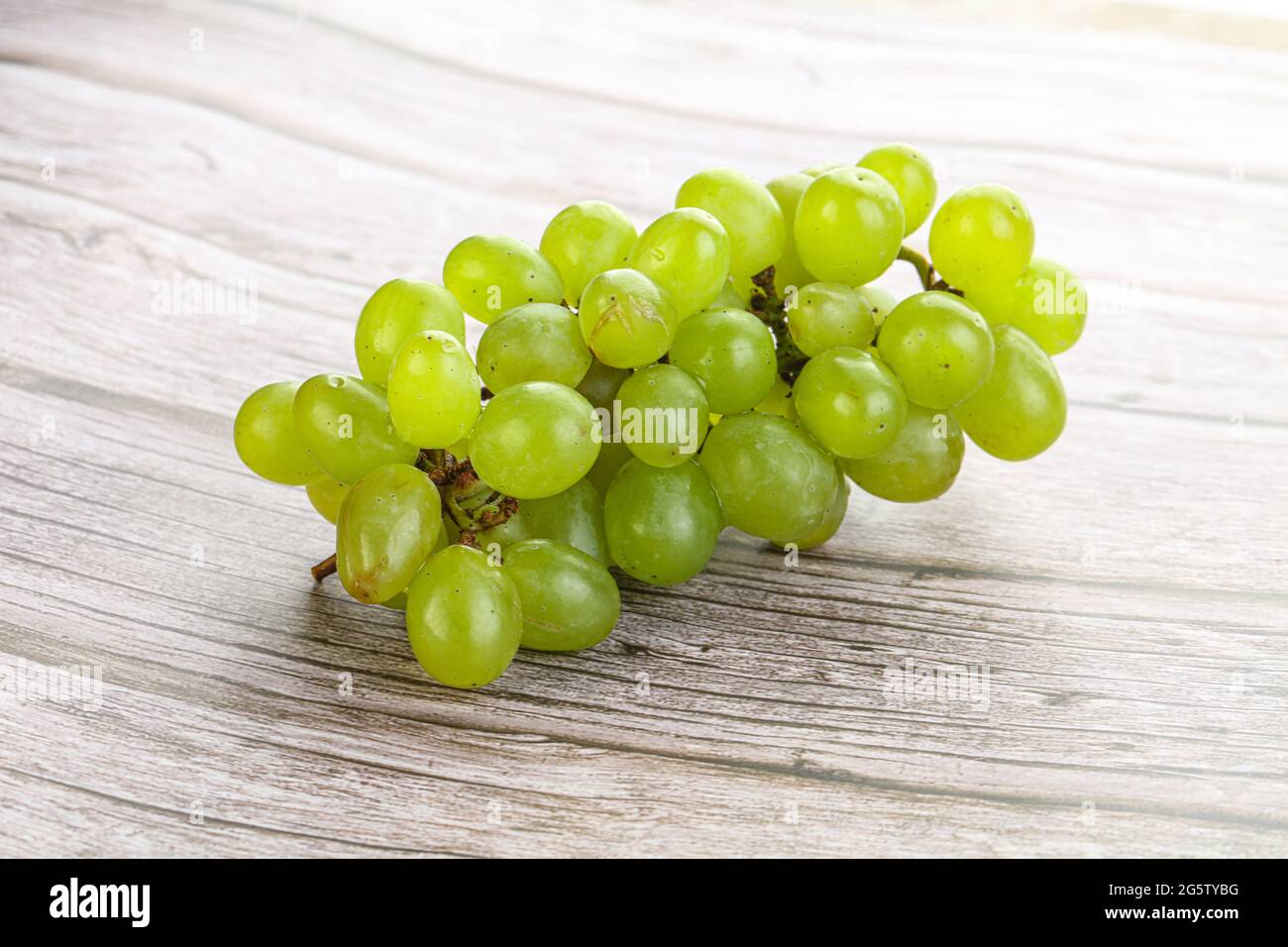 Ripe sweet green grape branch isolated Stock Photo - Alamy