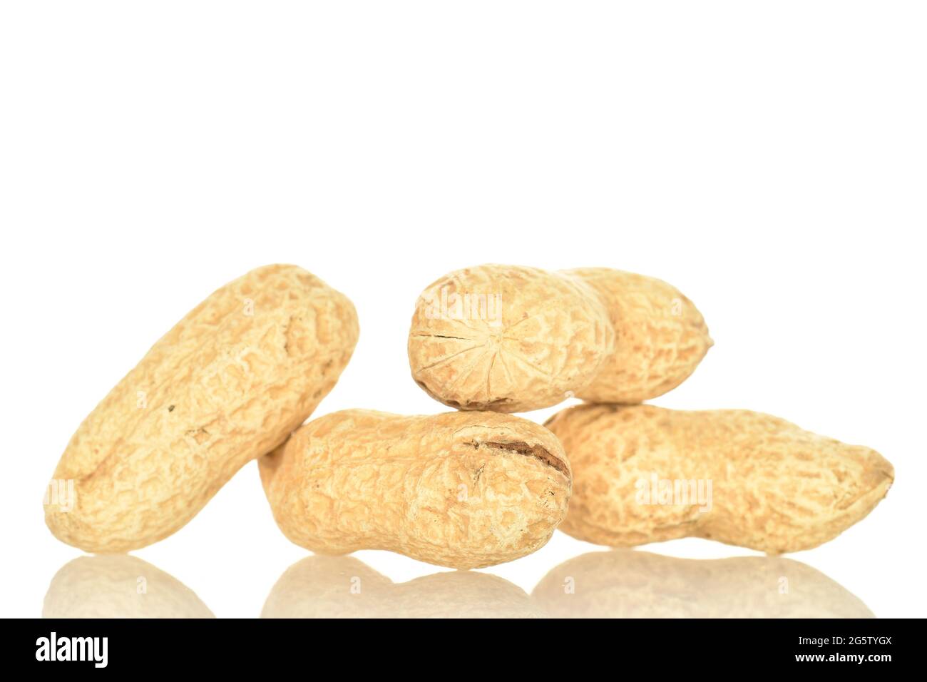 Ripe unpeeled peanuts, close-up, isolated on white background Stock ...
