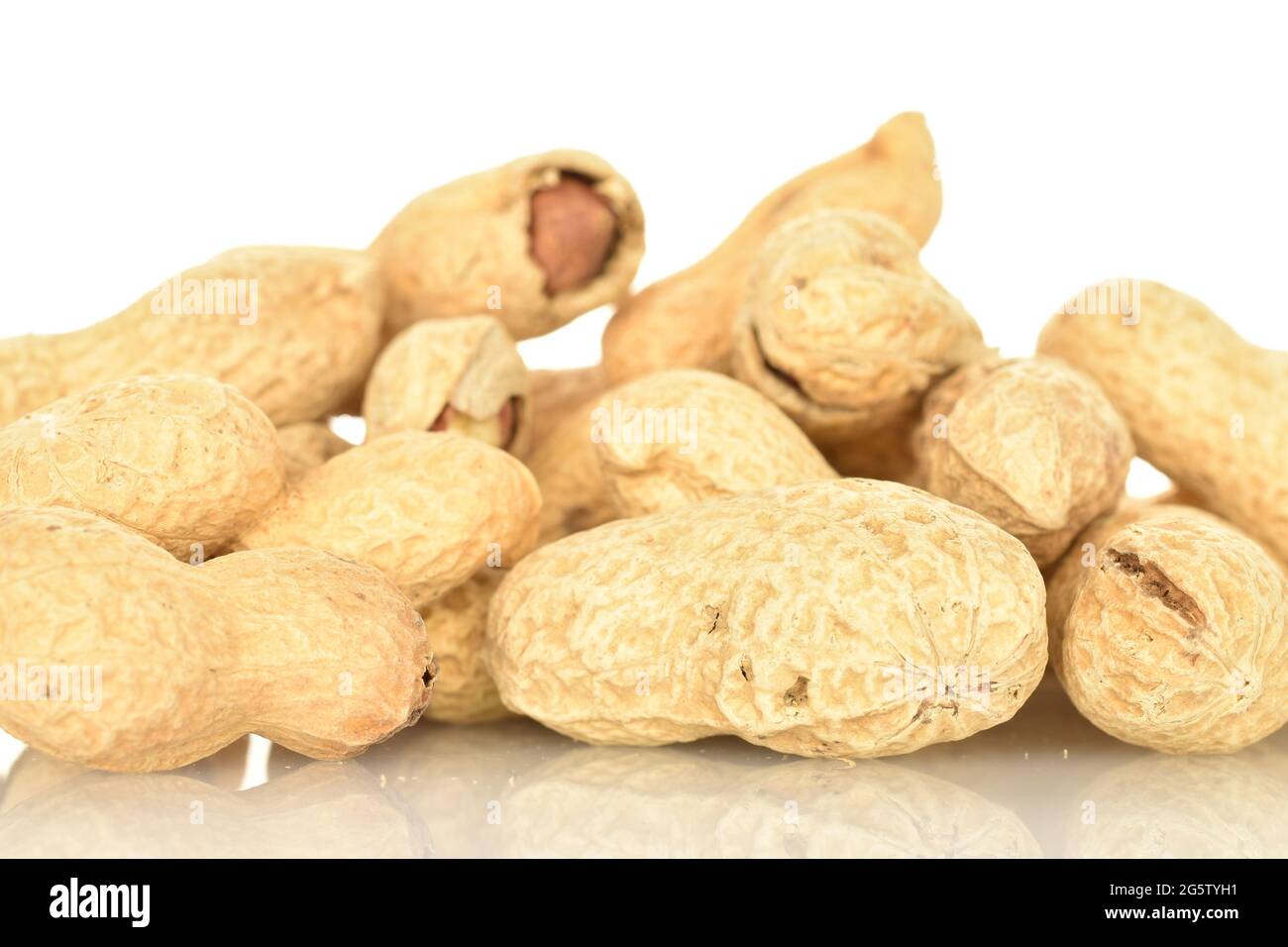Ripe unpeeled peanuts, close-up, isolated on white background Stock ...