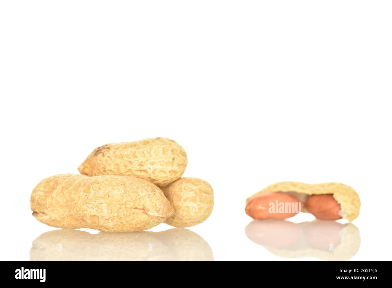 Ripe unpeeled peanuts, close-up, isolated on white background Stock ...