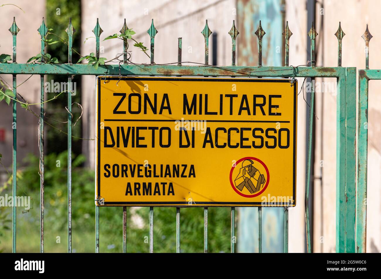 military sign that says military zone no access to armed surveillance ...