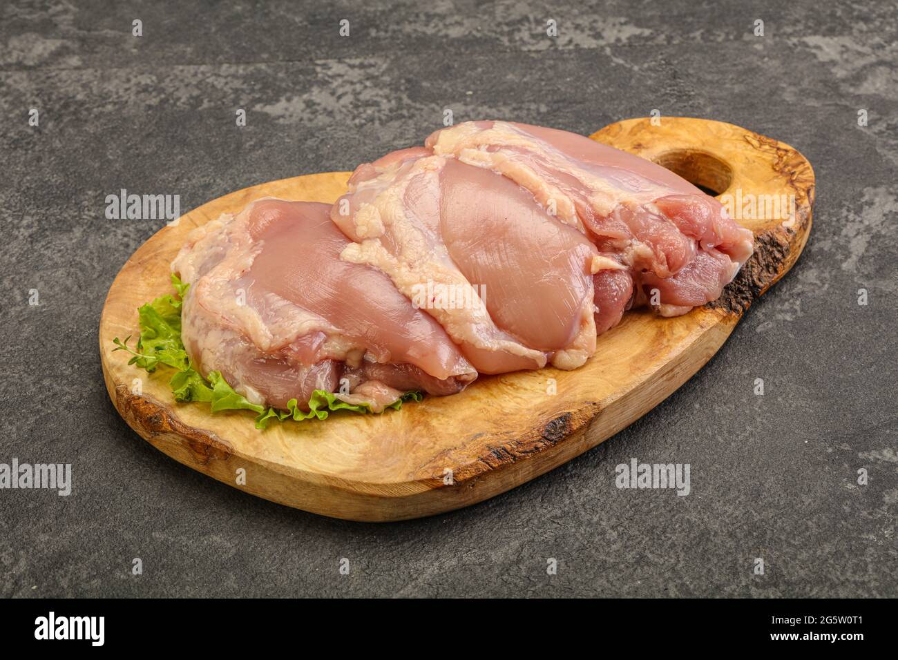 Raw chicken boneless and skinless leg for cooking Stock Photo - Alamy