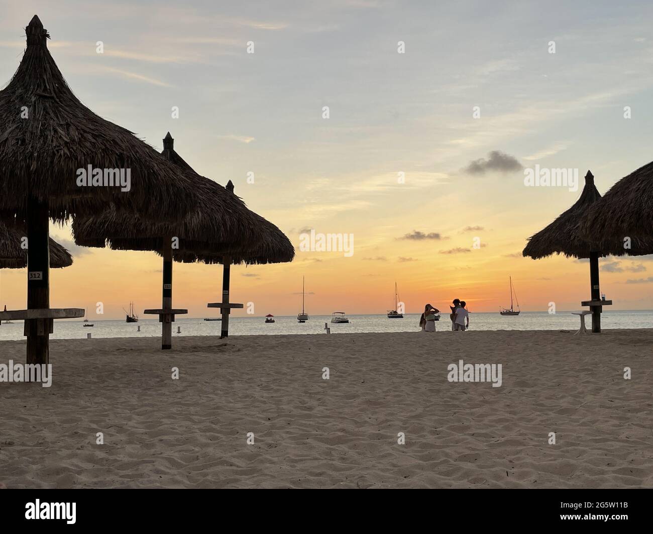 Beach in Aruba during a beautiful sunset Stock Photo - Alamy