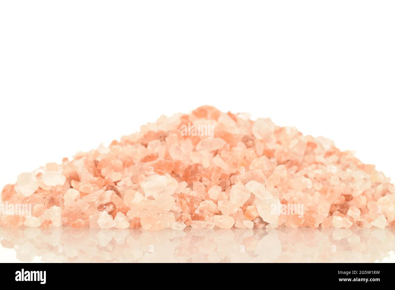 Rock salt of pink color, close-up, isolated on white Stock Photo - Alamy