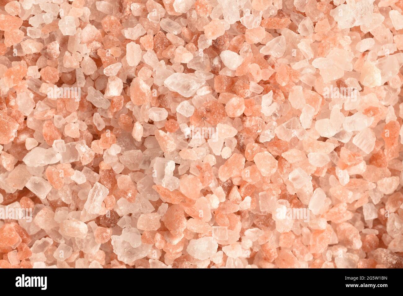 Rock salt of pink color, close-up, top view Stock Photo - Alamy